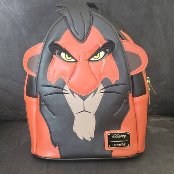 Loungefly | Bags | Loungefly Disney Scar Backpack Black And Orange ...